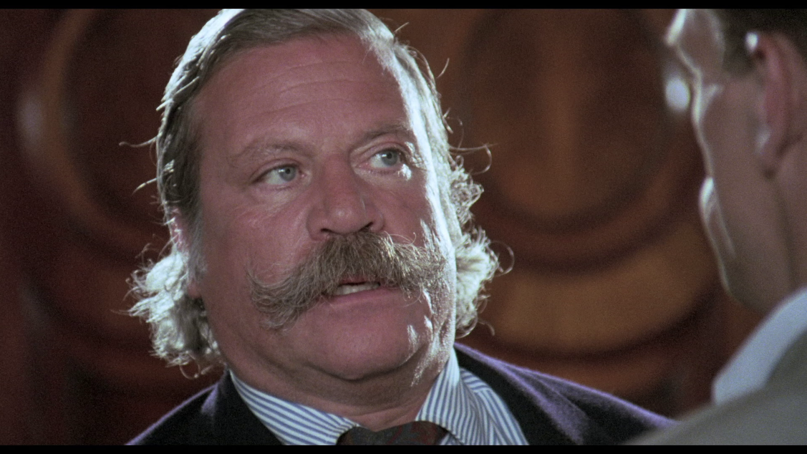 Oliver Reed handlebar mustache – The Farsighted